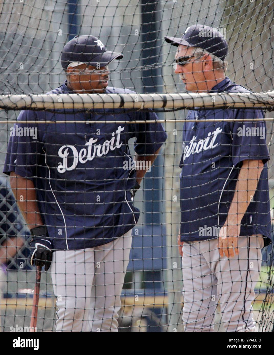 Detroit Tigers left fielder Jacque Jones, left, chats with manager Jim ...