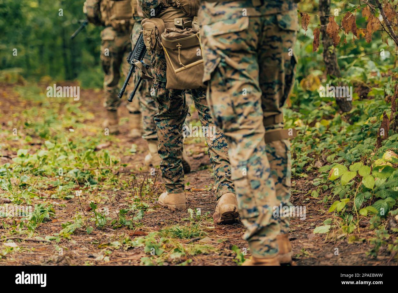 Modern warfare Soldiers Squad Running as Team in Battle Formation Stock ...