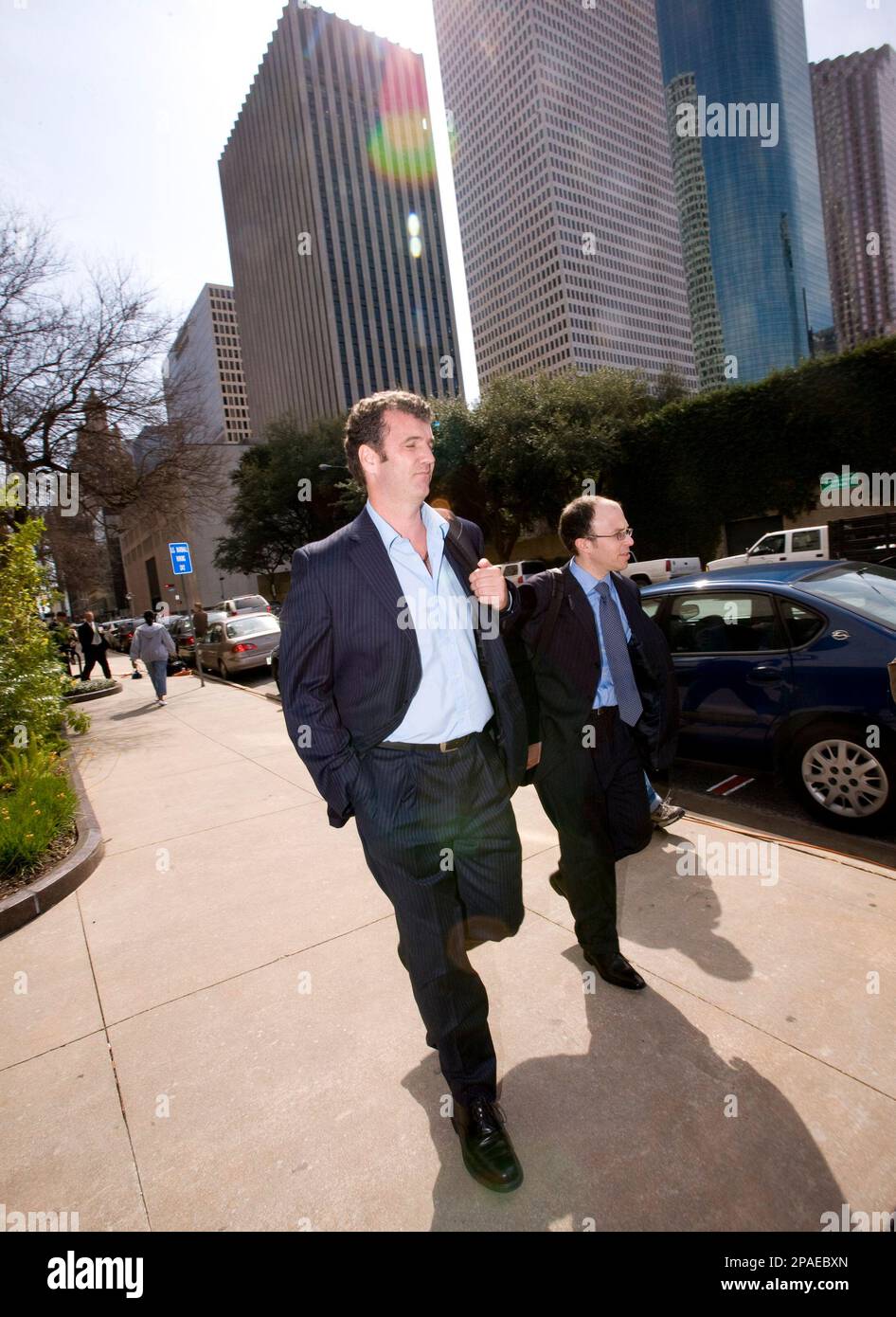 British banker Gary Mulgrew leaves at the Bob Casey Federal Courthouse ...