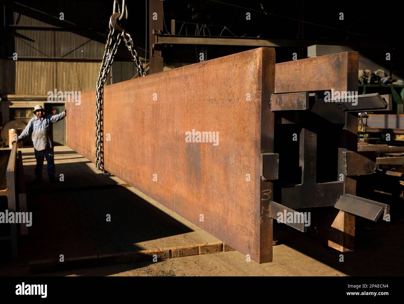 Rylan Graham guides a steel column at Banker Steel on Wednesday, Oct ...