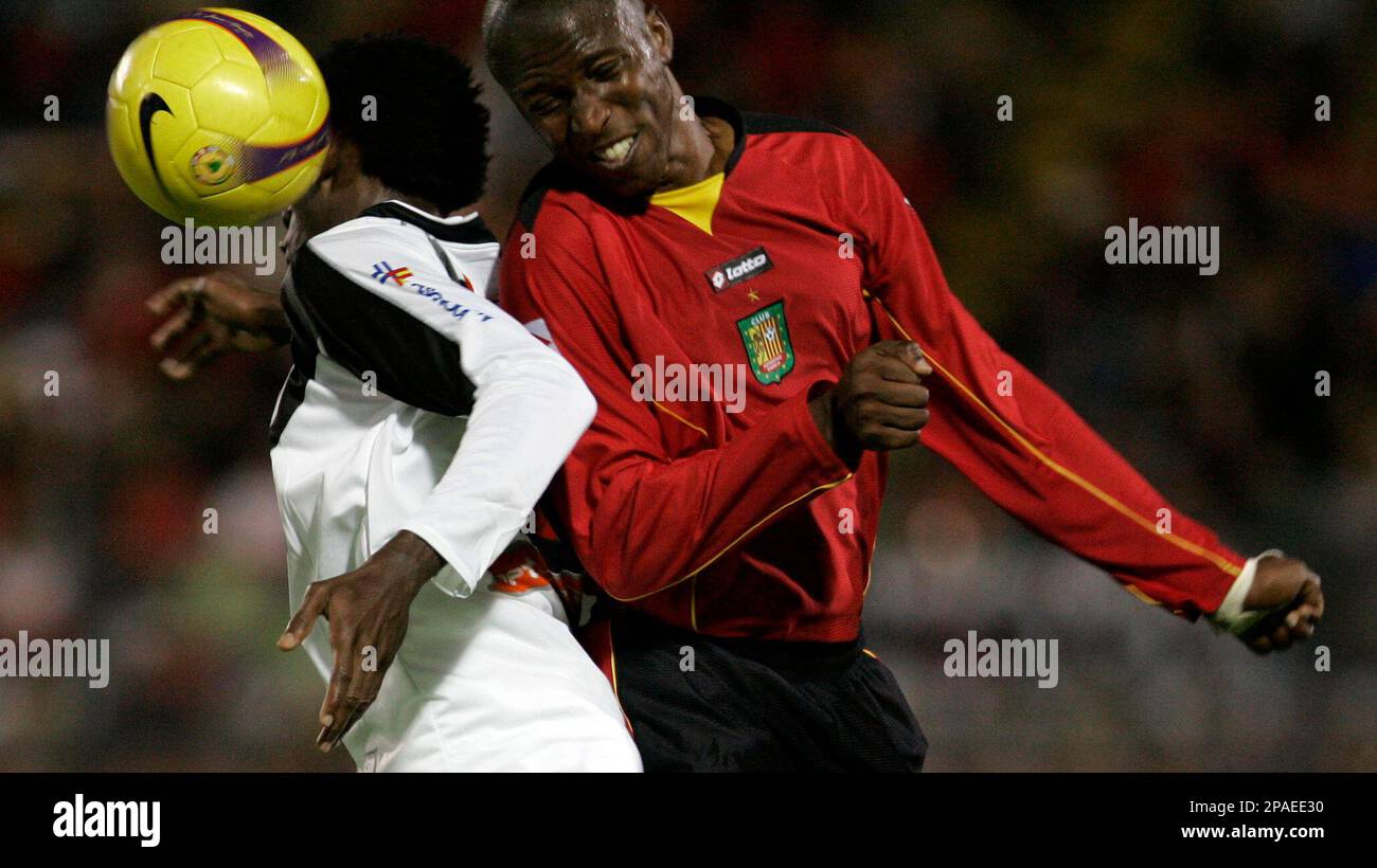 Ecuador's Deportivo Cuenca's Arlin Ayovi , right, fights for the ball ...