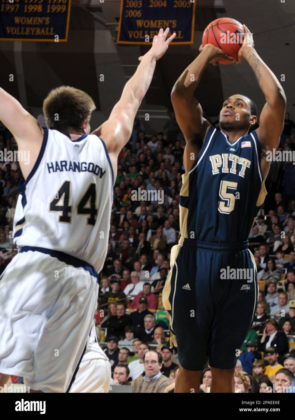 Pittsburgh guard Tyrell Biggs, right, puts up a shot while Notre Dame ...