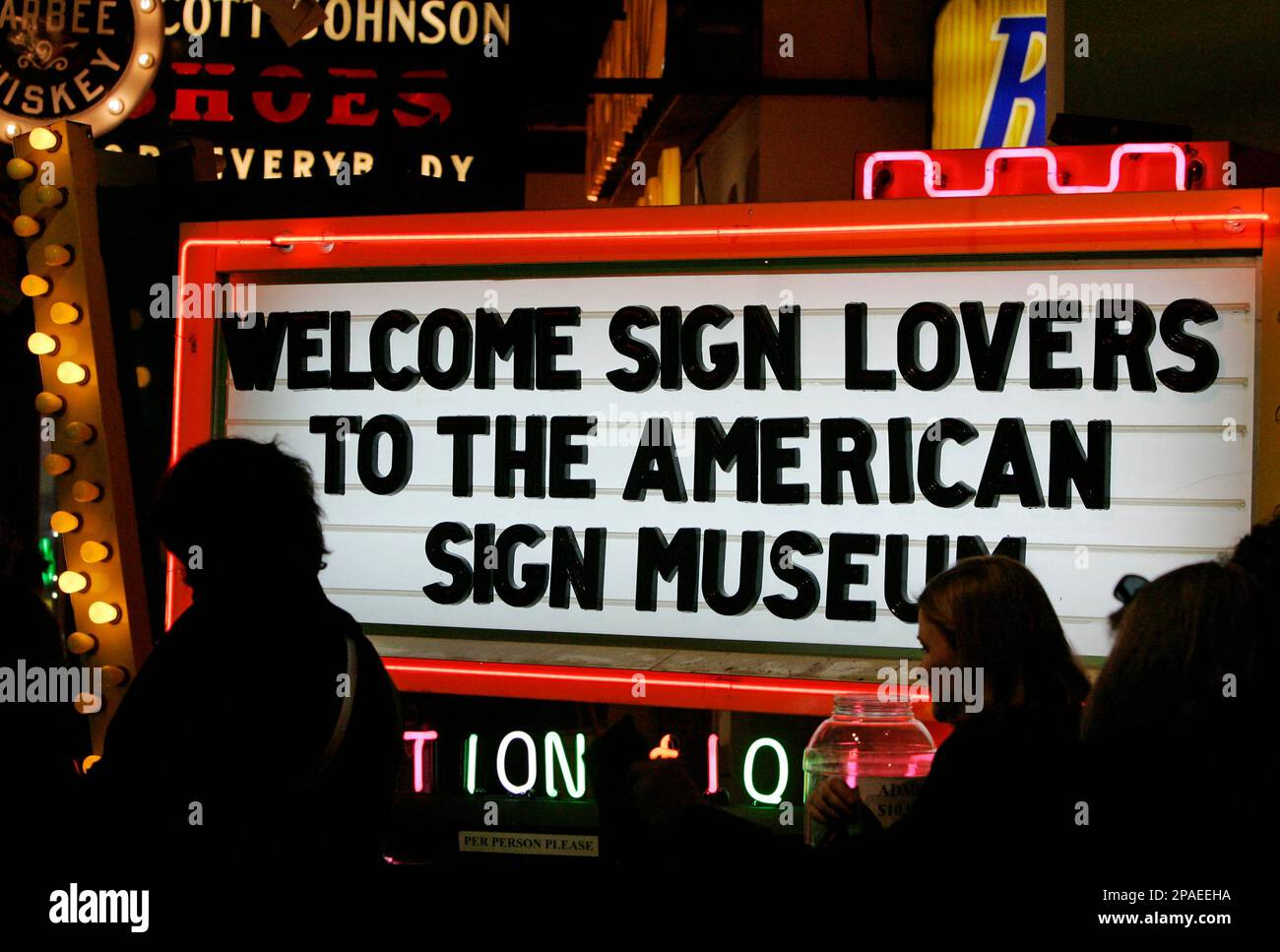 A tour group enters the American Sign Museum, Wednesday, Jan. 23, 2008 ...