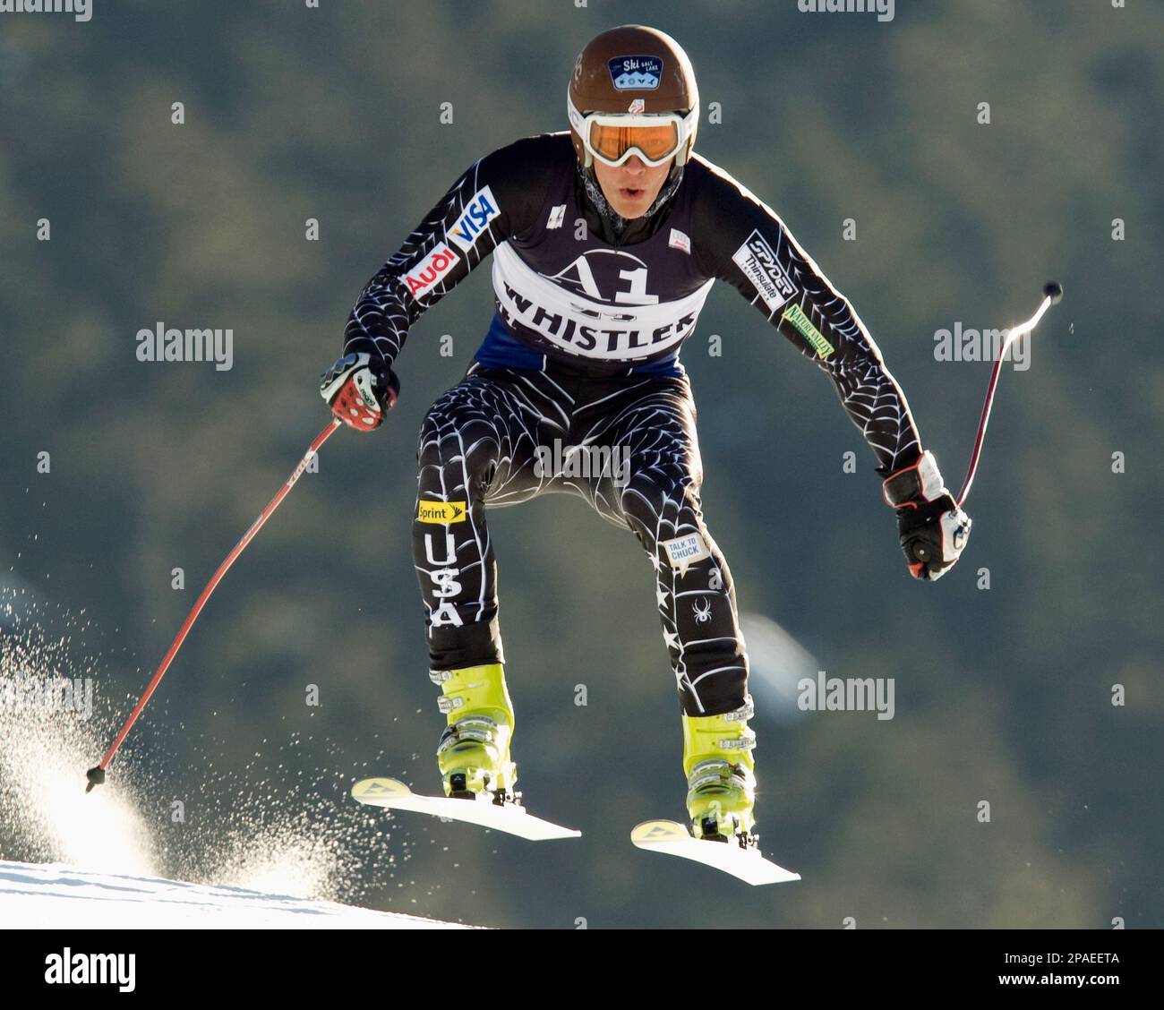 Steven Nyman, of the United States, soars through the air on his way to ...