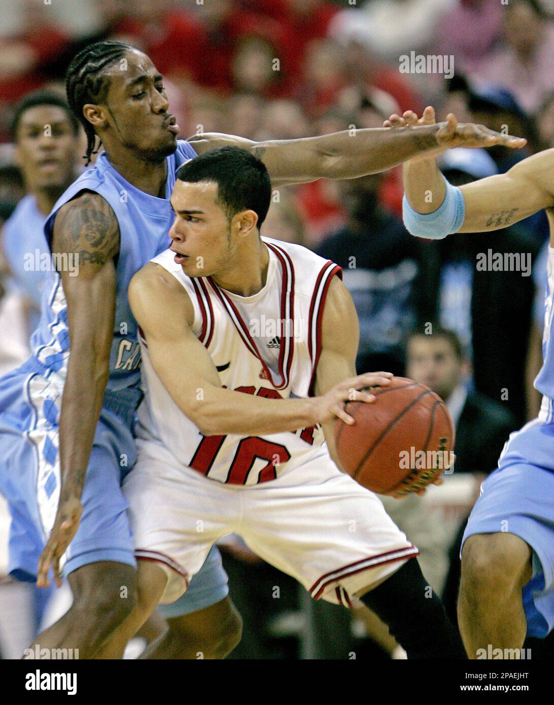 North Carolina's Quentin Thomas, left, guards North Carolina State's ...