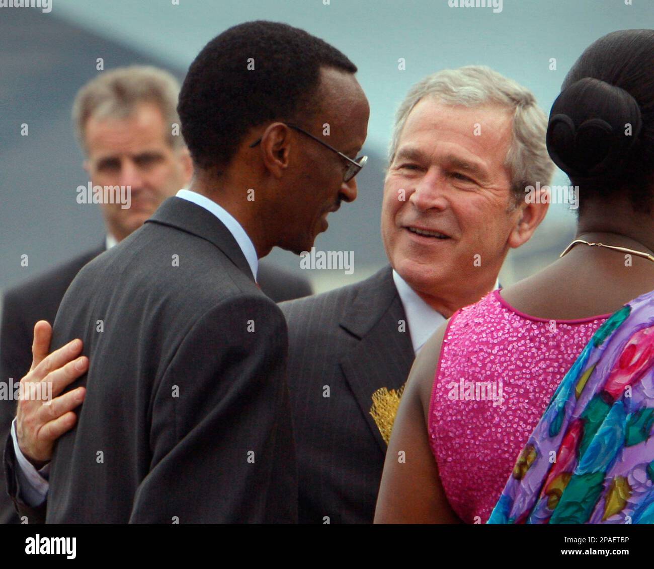 U.S. President George W. Bush, centre reacts with Rwandan President ...