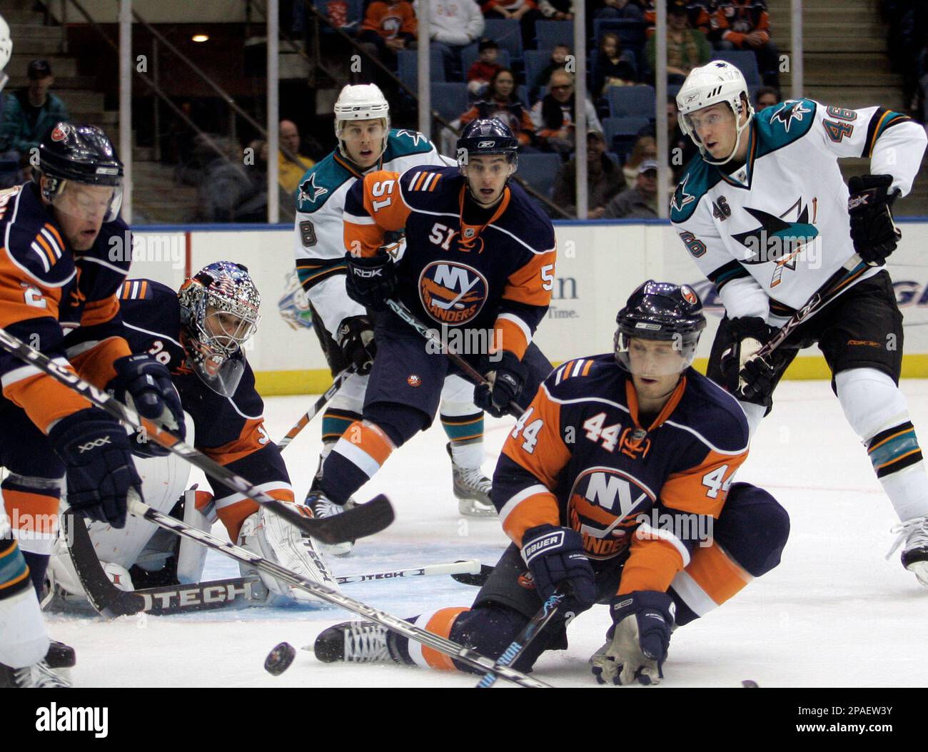 New York Islanders' Aaron Johnson (2) goalie Rick DiPietro, Frans ...