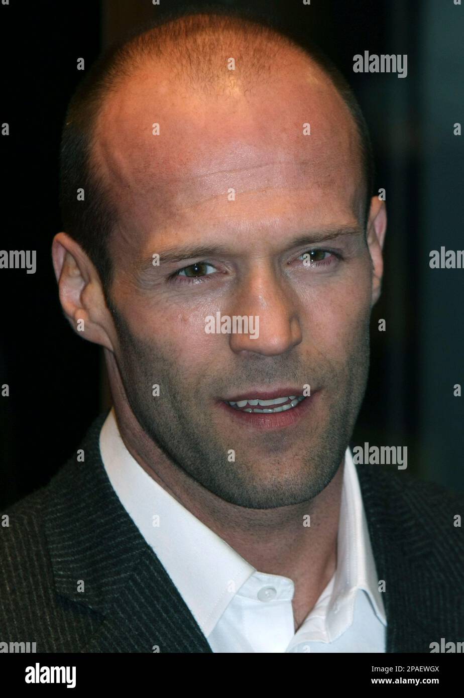 British actor Jason Statham poses for photographers as he arrives at ...