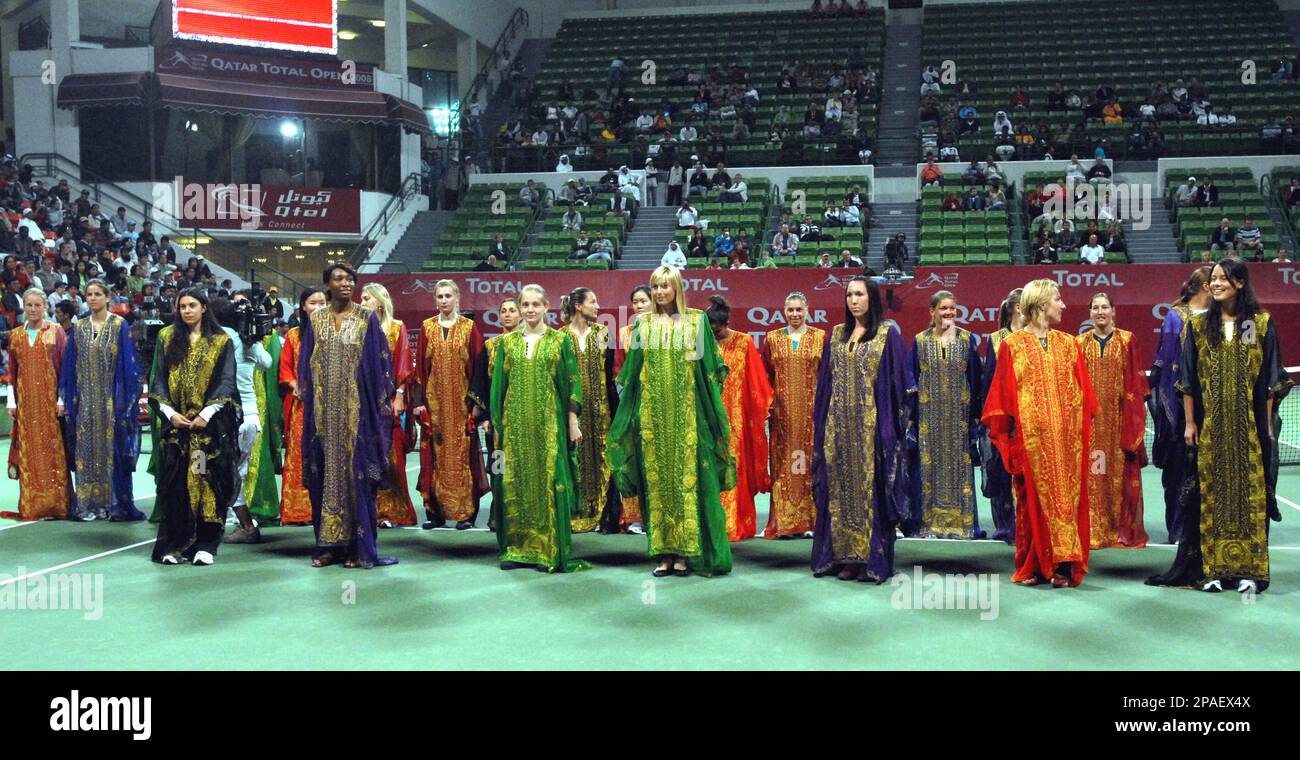Tennis stars line up wearing tradition Qatari attire, duringt the ...