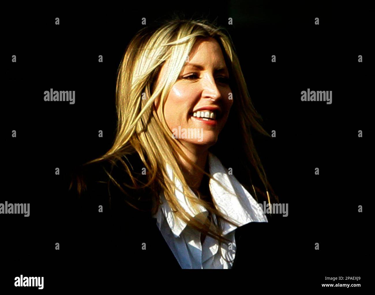 Heather Mills smiles as she leaves the High Court in London, Monday ...
