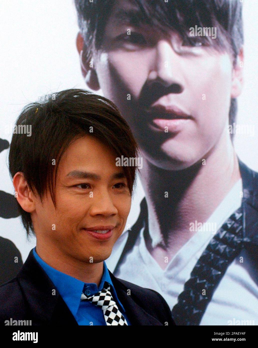 Taiwanese singer David Tao smiles as he promotes his world tour concert ...