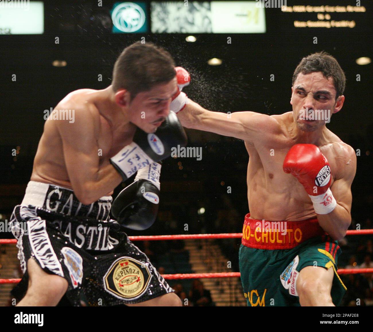 Fernando Montiel, of Mexico, connects with a hard right to Martin ...