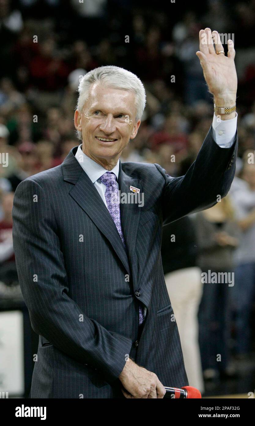 Former South Carolina basketball player John Roche waves to fans during ...