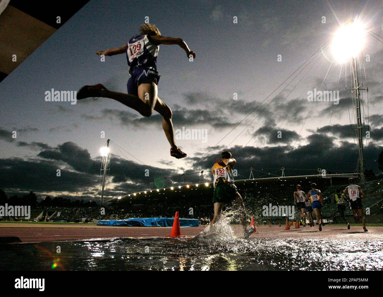 Competitors in the men's 3,000-meter Steeplechase race at the Sydney ...