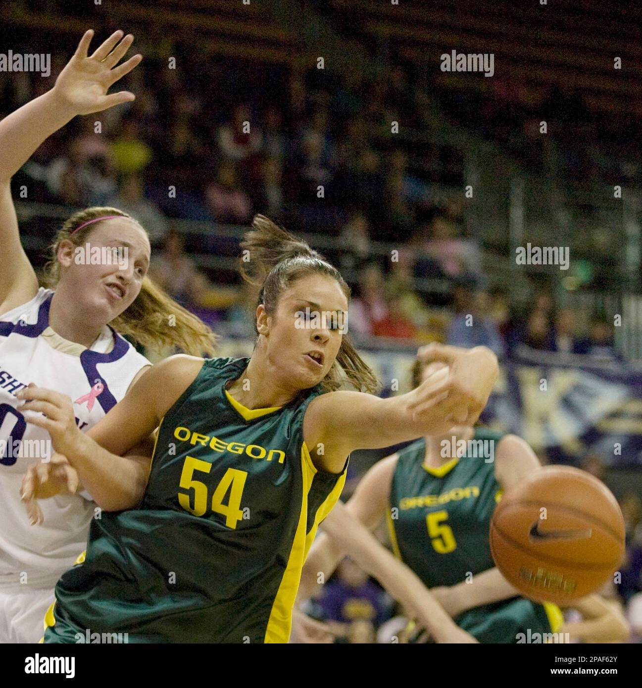 Oregon's Nicole Canepa, right, goes for a loose ball while be guarded ...