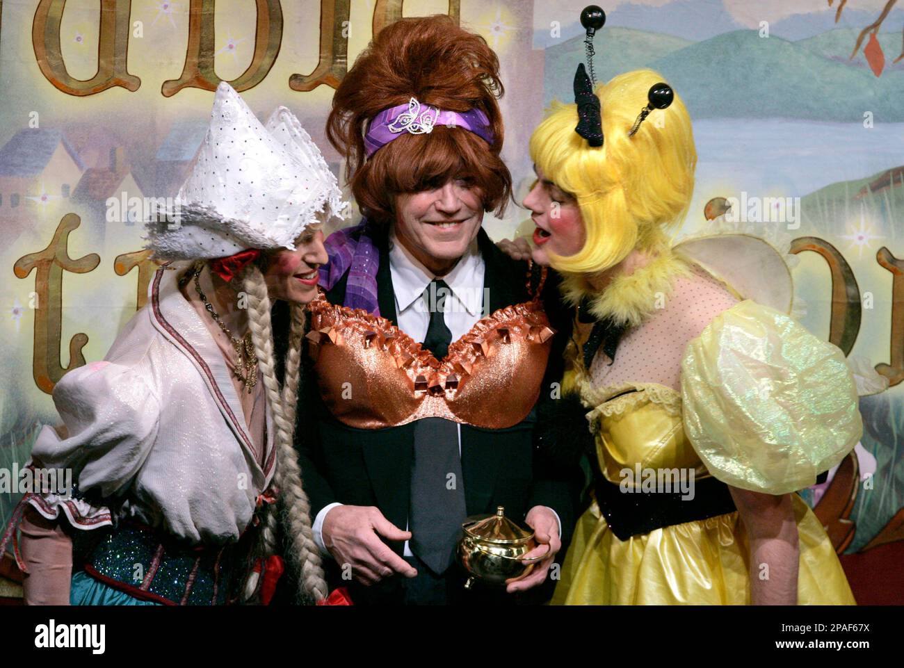 Actor Christopher Walken holds his "Pudding Pot" award while being ...