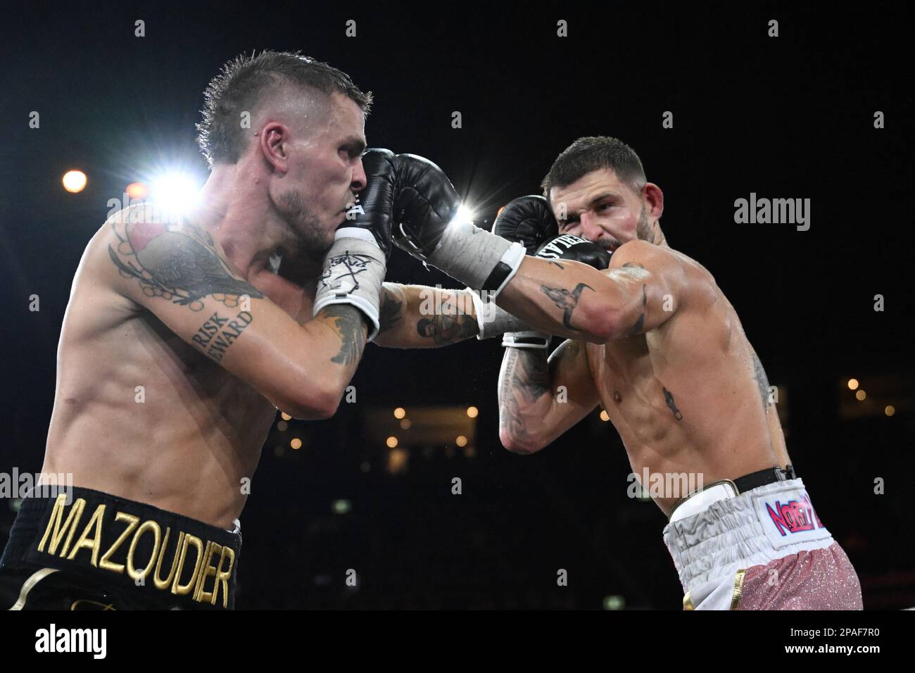 Koen Mazoudier (left) and Ben Mahoney in action during the undercard ...