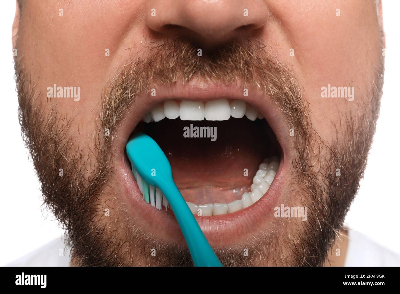 Man brushing teeth on white background, closeup. Dental care Stock ...