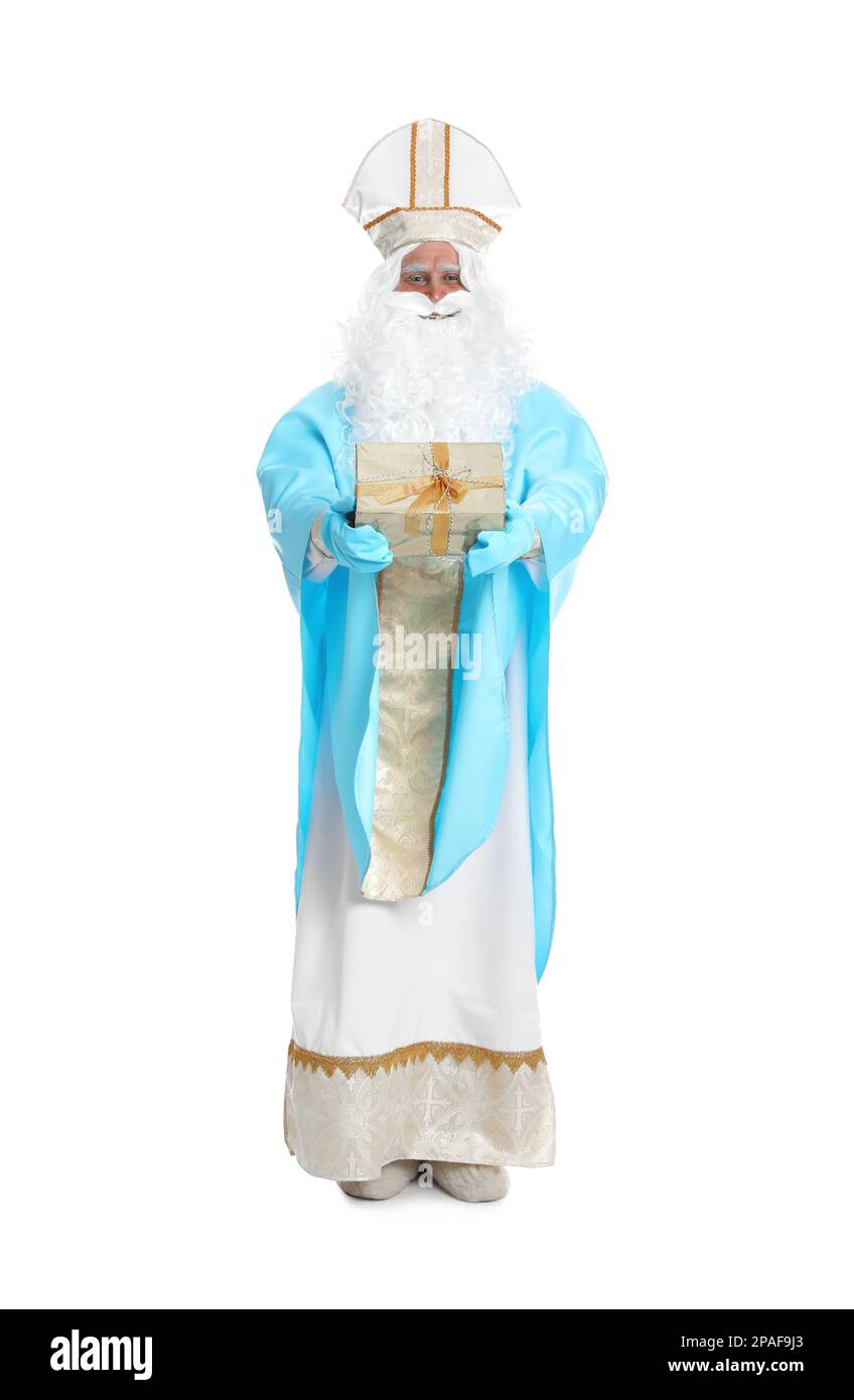 Full length portrait of Saint Nicholas with present on white background ...