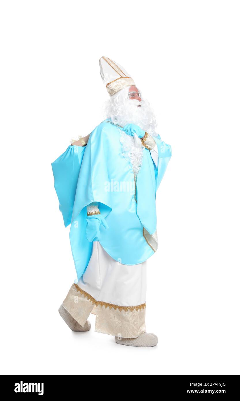 Full length portrait of Saint Nicholas holding sack with presents on ...