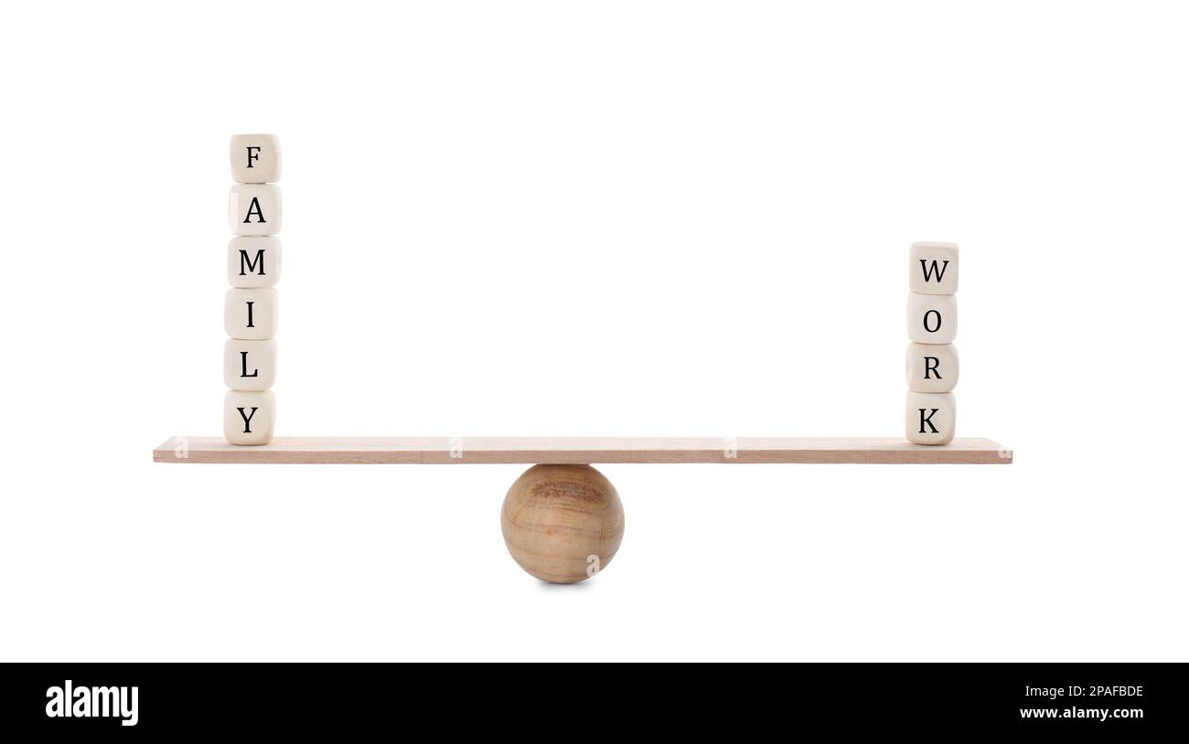 Work family balance concept. Wooden ball with cubes and small plank on ...