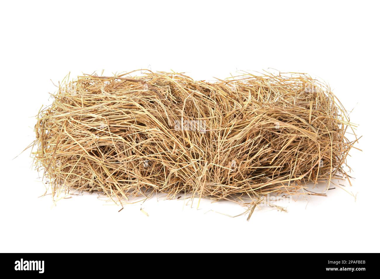 Small dried hay bale on white background Stock Photo - Alamy