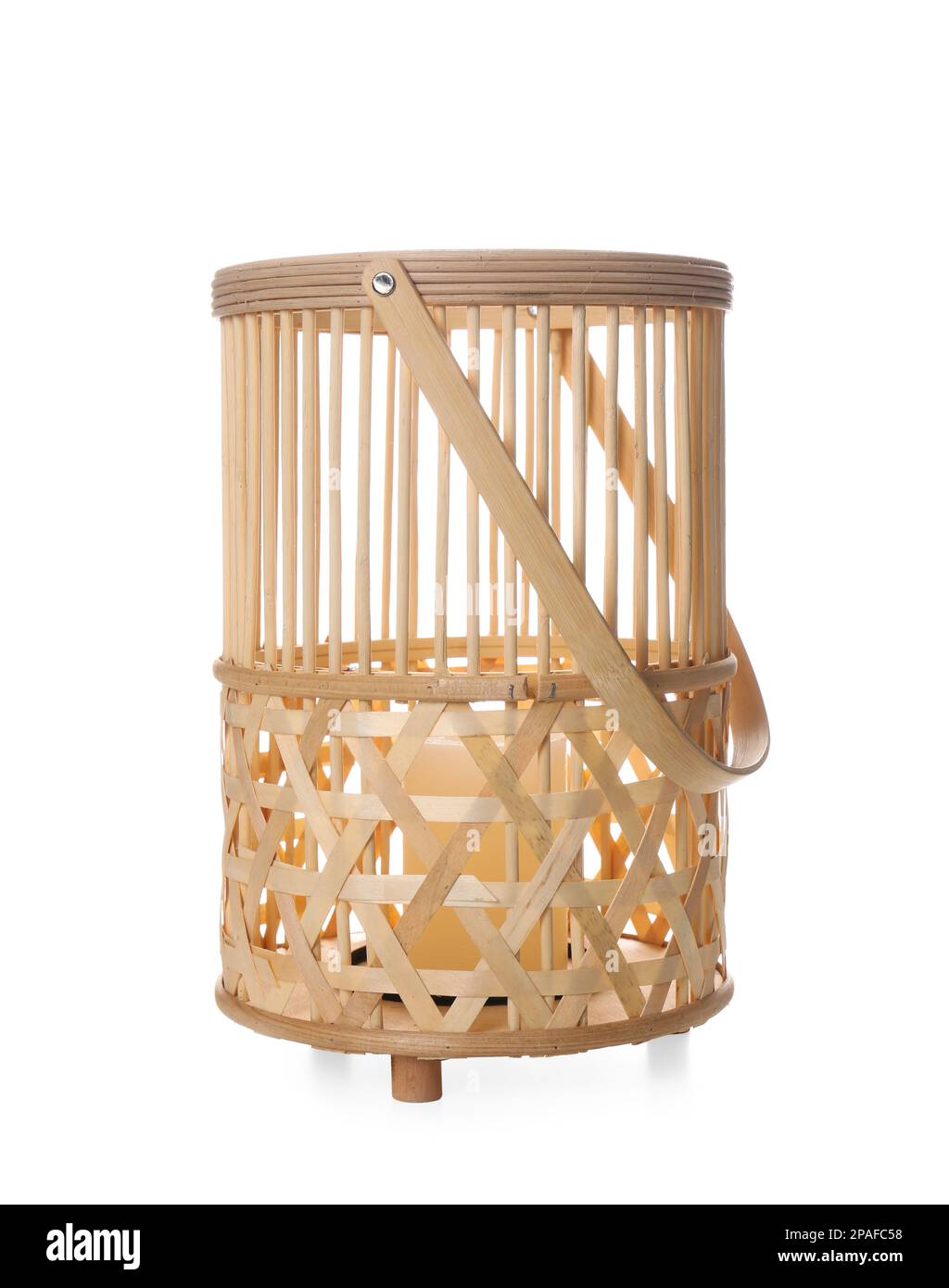Stylish wicker holder with candle isolated on white Stock Photo - Alamy