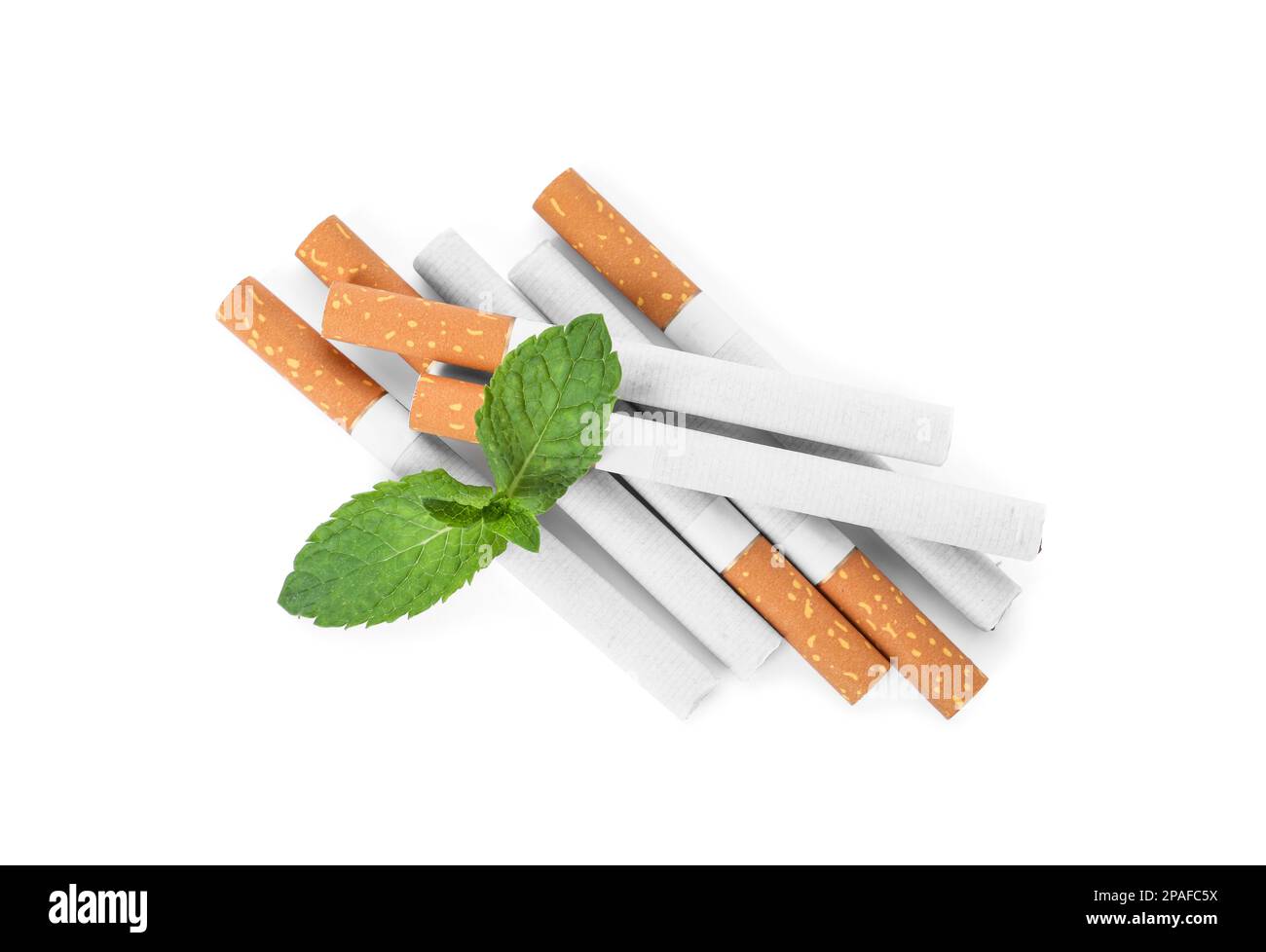 Menthol cigarettes and fresh mint leaves on white background, flat lay ...