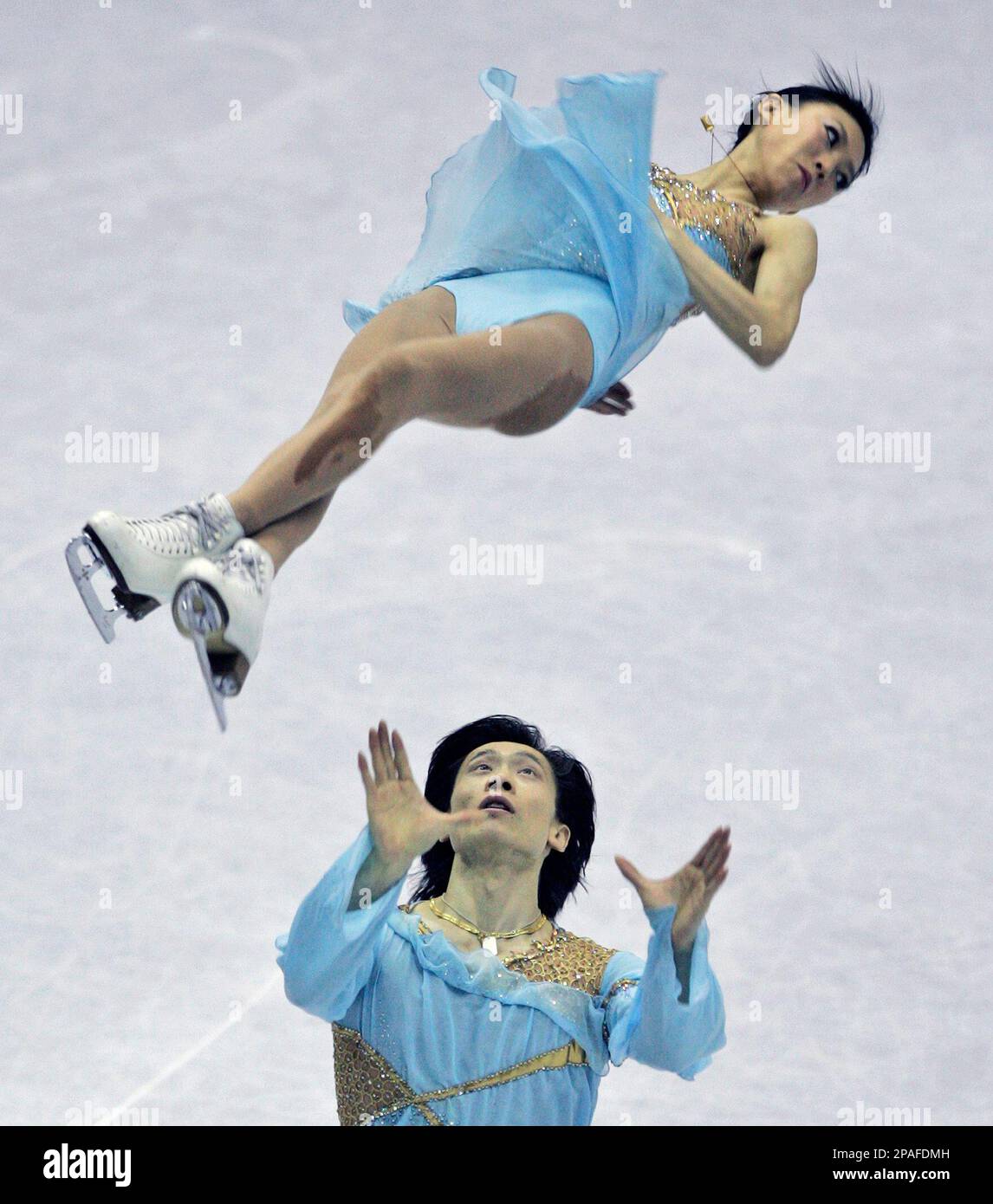 China's Qing Pang, top, and Jian Tong perform during their pairs free ...