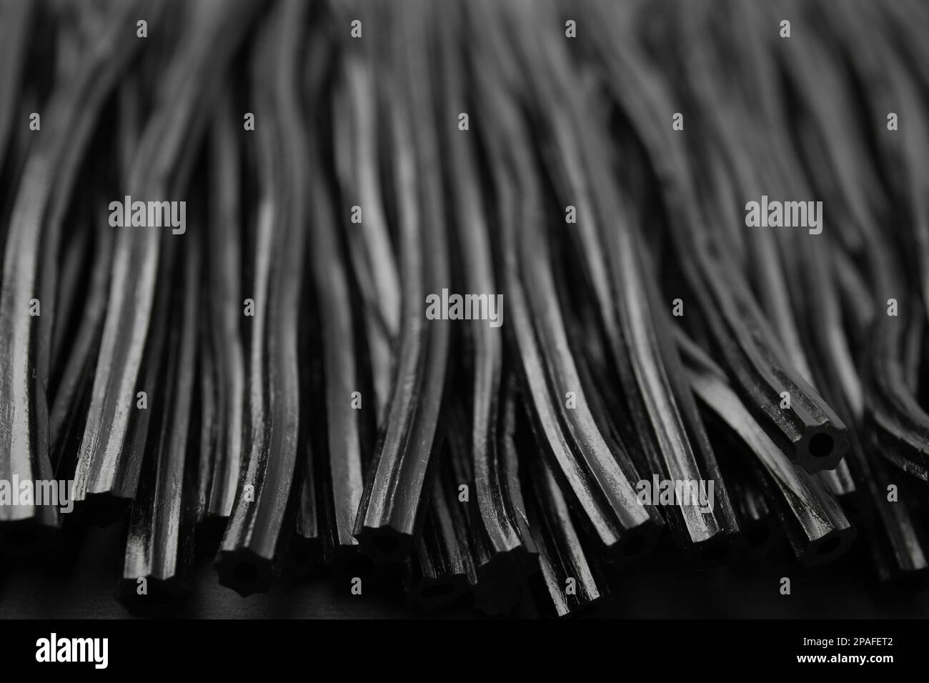 Tasty black liquorice candies as background, closeup Stock Photo - Alamy