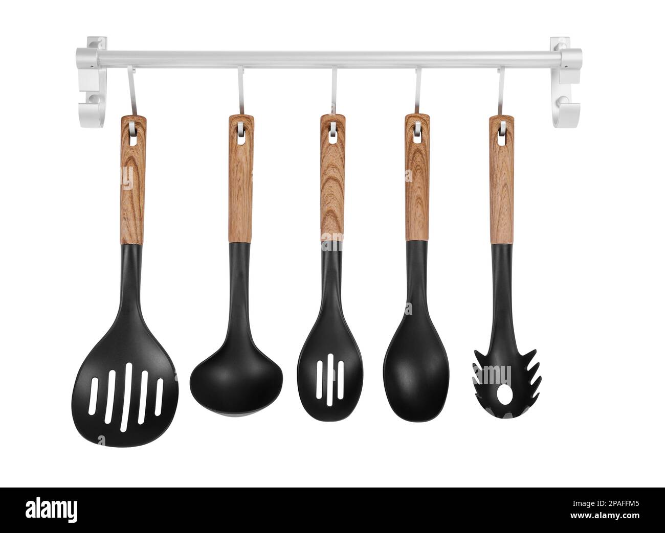 Metal rack with set of kitchen utensils on white background Stock Photo ...