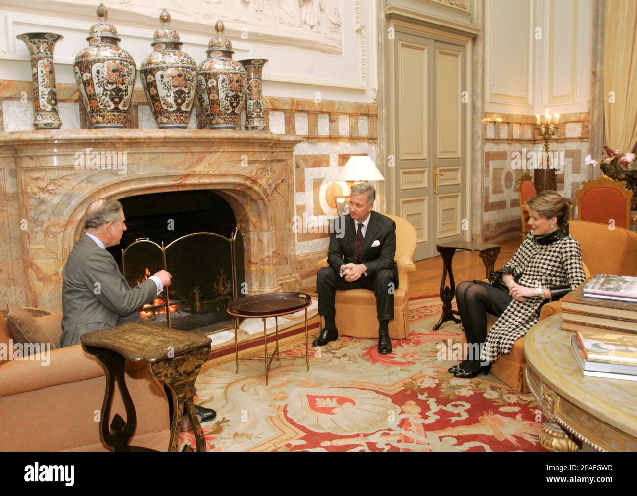 Belgium's Crown Prince Philippe, center, and his wife, Princess ...