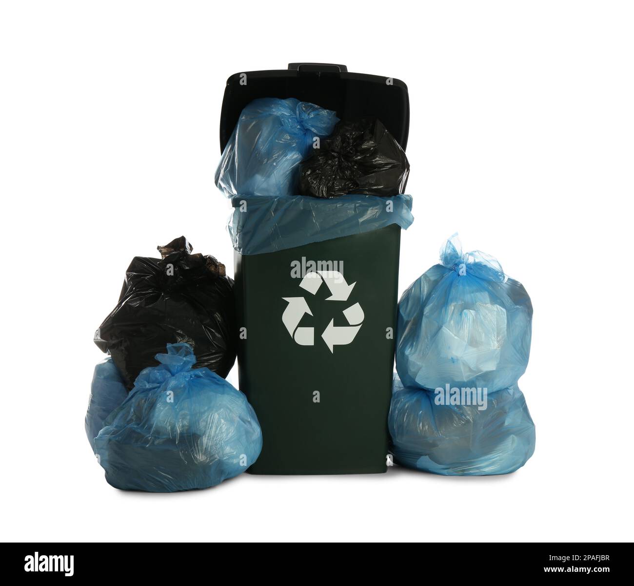 Dark green recycling bin overfilled with garbage bags on white ...