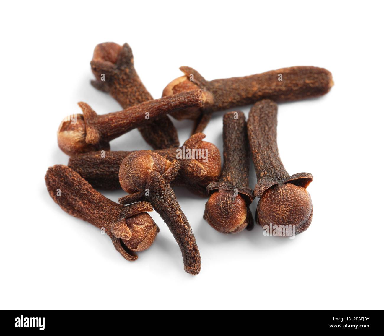 Pile of aromatic dry cloves on white background Stock Photo - Alamy