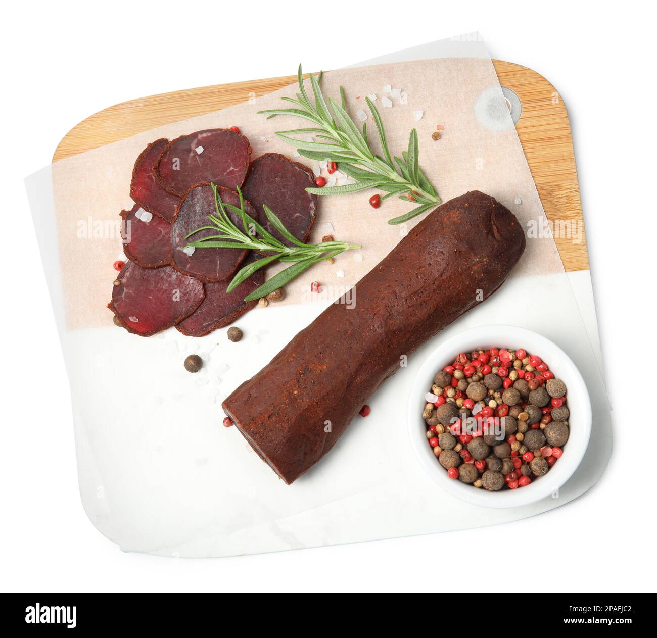 Delicious dry-cured beef basturma with rosemary and spices on white ...