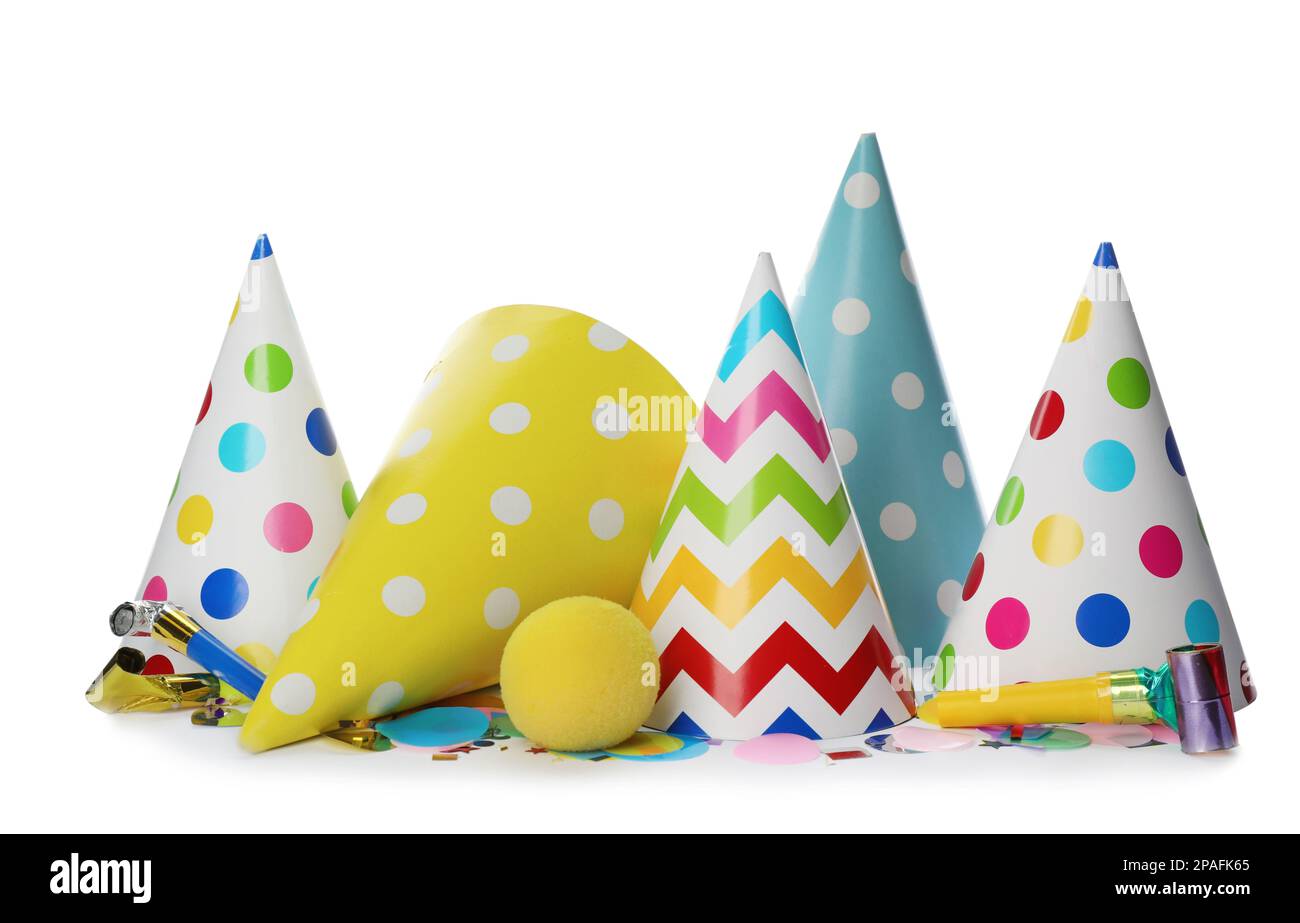 Colorful party hats and other festive items on white background Stock ...