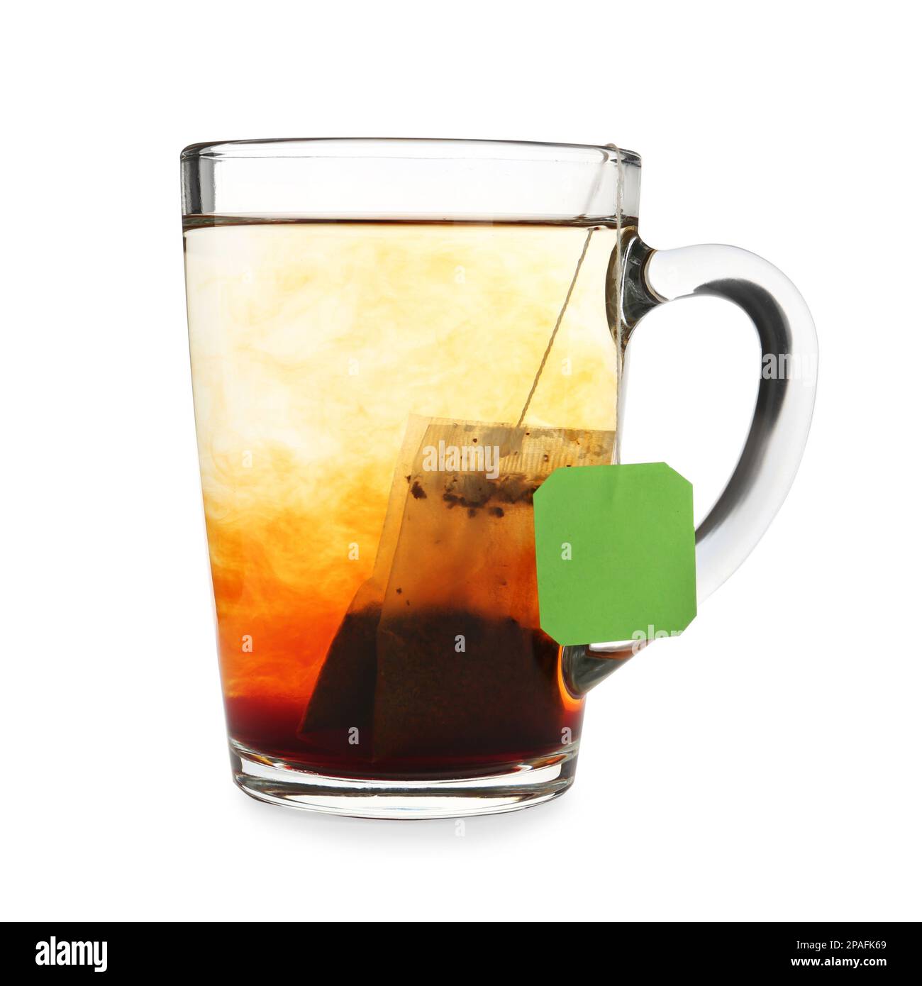 Tea bag in glass cup of hot water isolated on white Stock Photo - Alamy