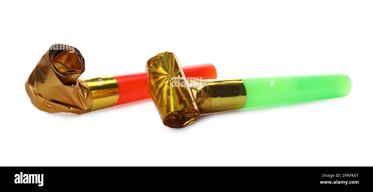 Bright party blowers on white background. Festive items Stock Photo - Alamy