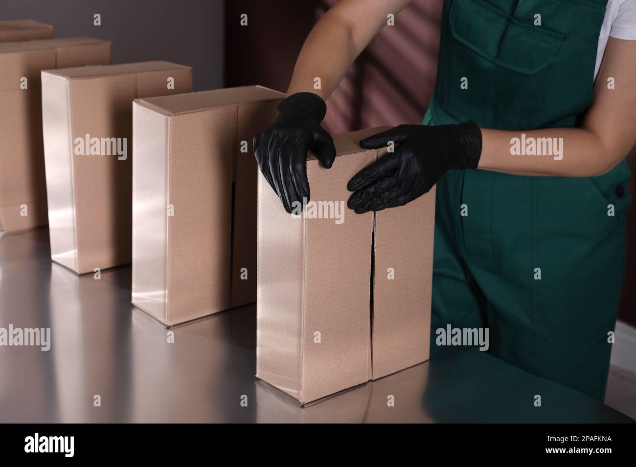Production line boxes hi-res stock photography and images - Alamy