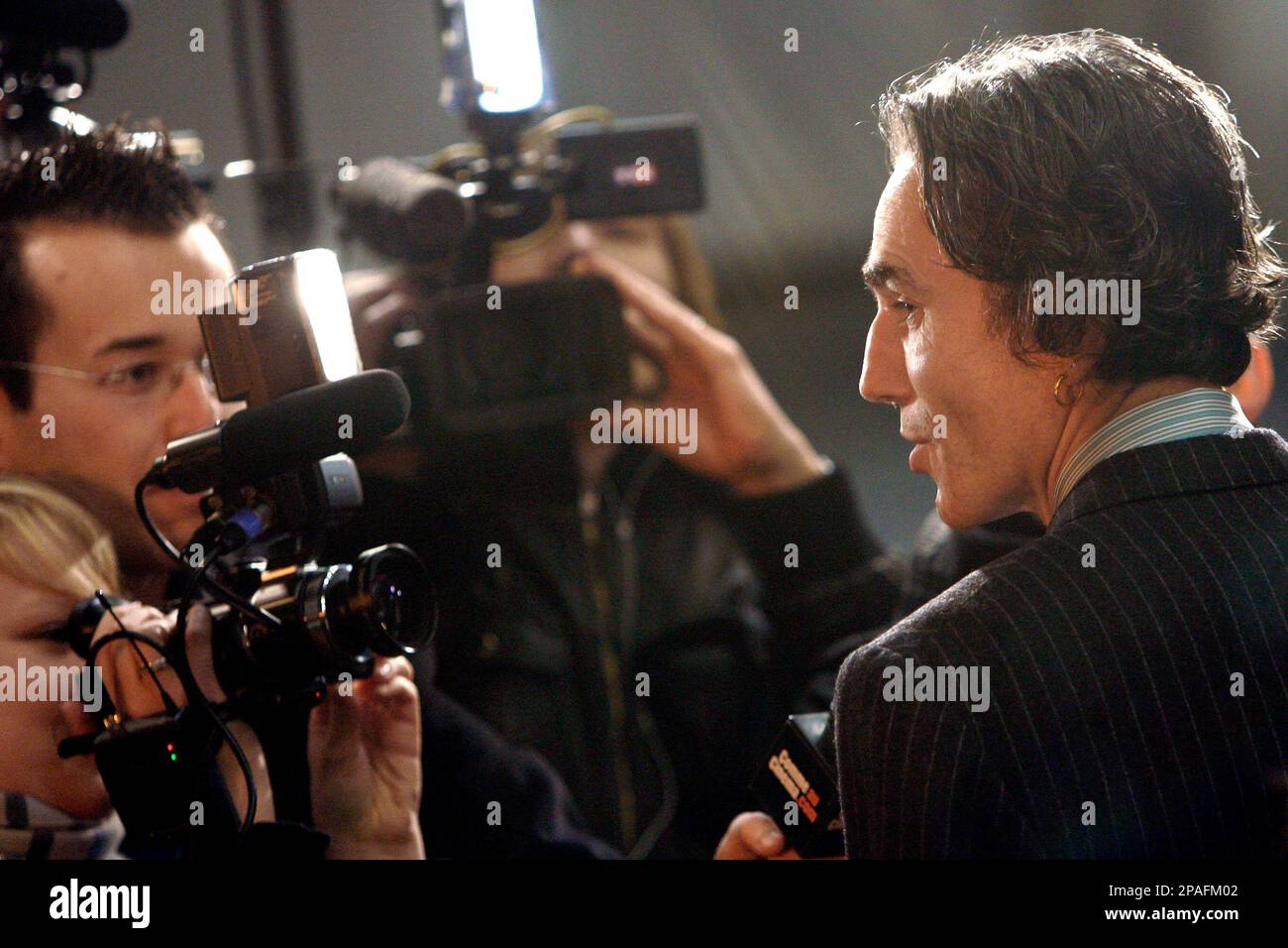 British actor Daniel Day-Lewis speaks to reporters before the screening ...