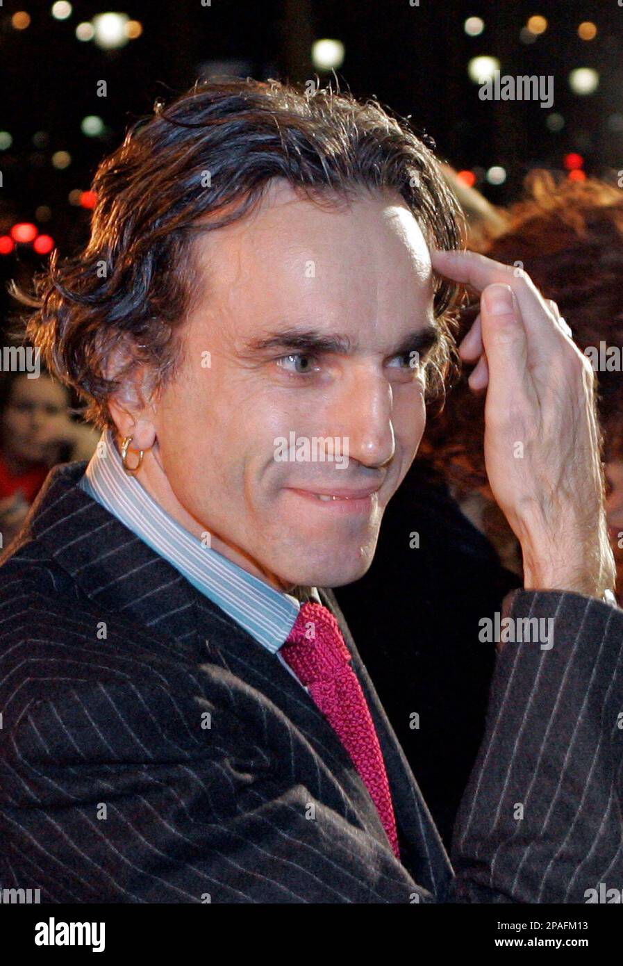 British actor Daniel Day-Lewis smiles as he arrives for the screening ...
