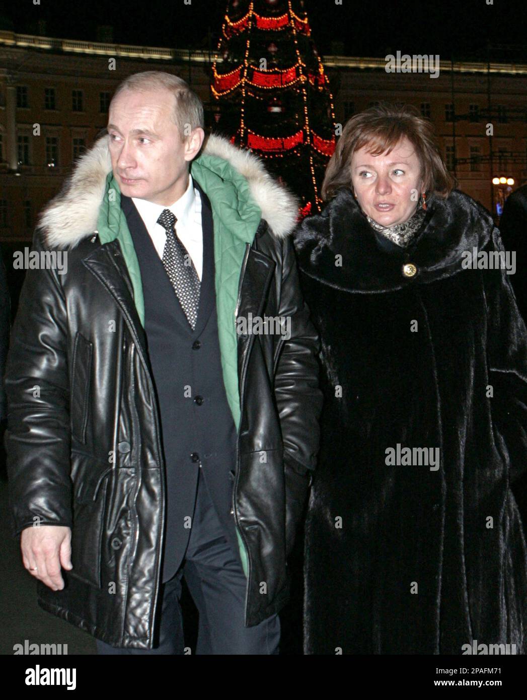 File Russian President Vladimir Putin Left And And His Wife
