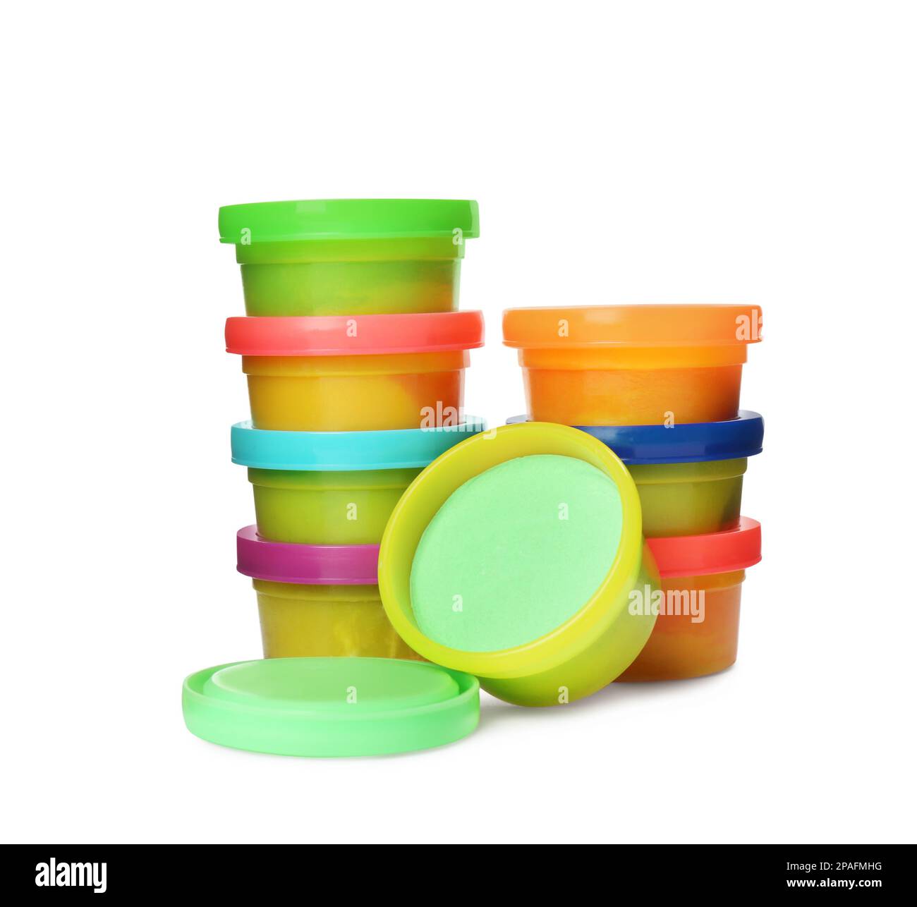 Plastic containers with colorful play dough on white background Stock ...