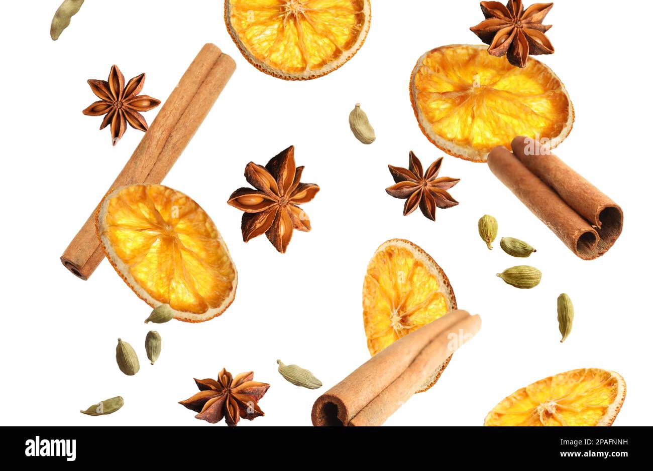 Slices of dried orange, aromatic anise stars, cinnamon and cardamom ...