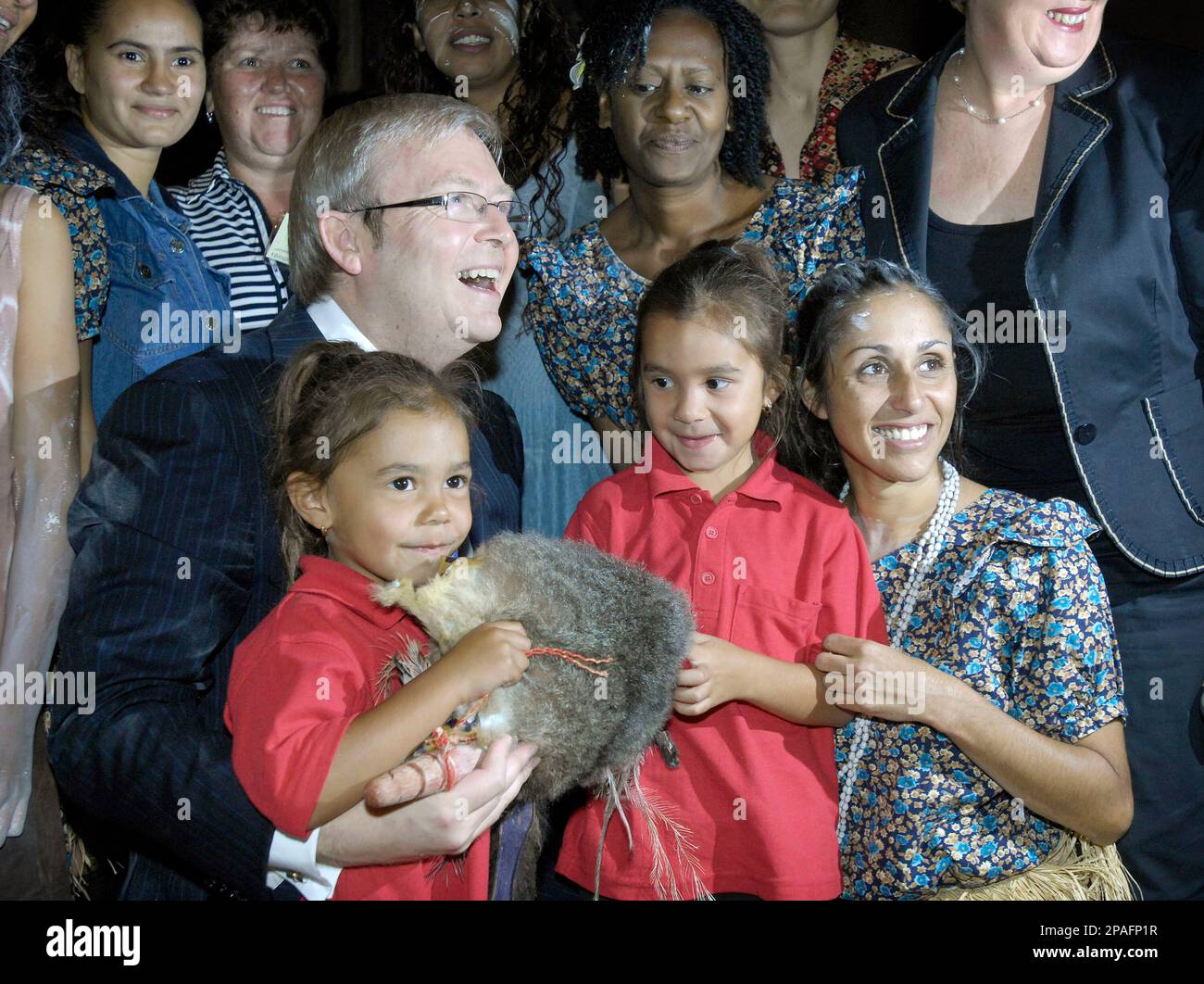Australian Prime Minister Kevin Rudd, left in front, is surrounded by ...