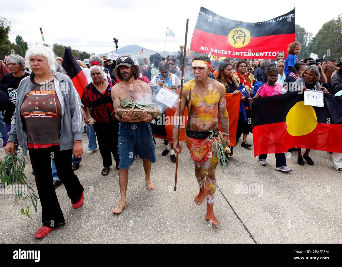 Aborigines march on Parliament House in Canberra, Australia, Tuesday ...