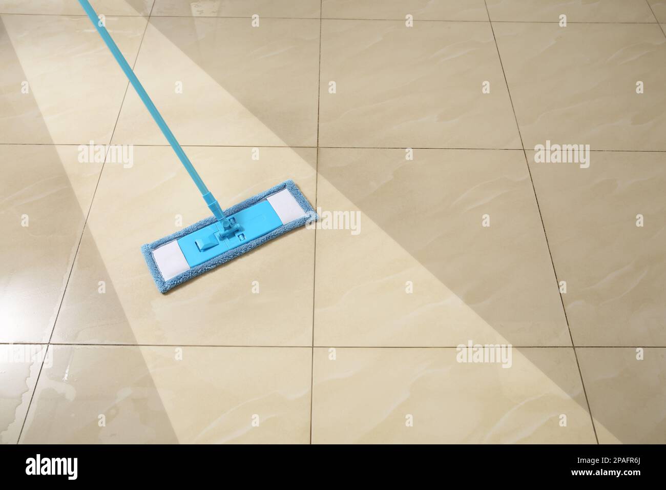 Washing of floor with mop. Difference before and after cleaning Stock ...