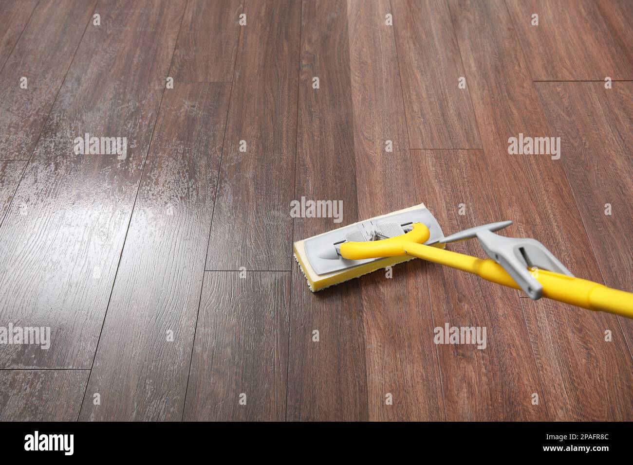 Washing of floor with mop. Difference before and after cleaning Stock ...