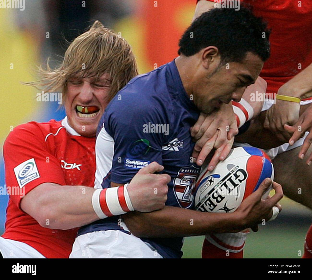 Wales' Lee Beach brings down the United States' Nese Malifa during ...