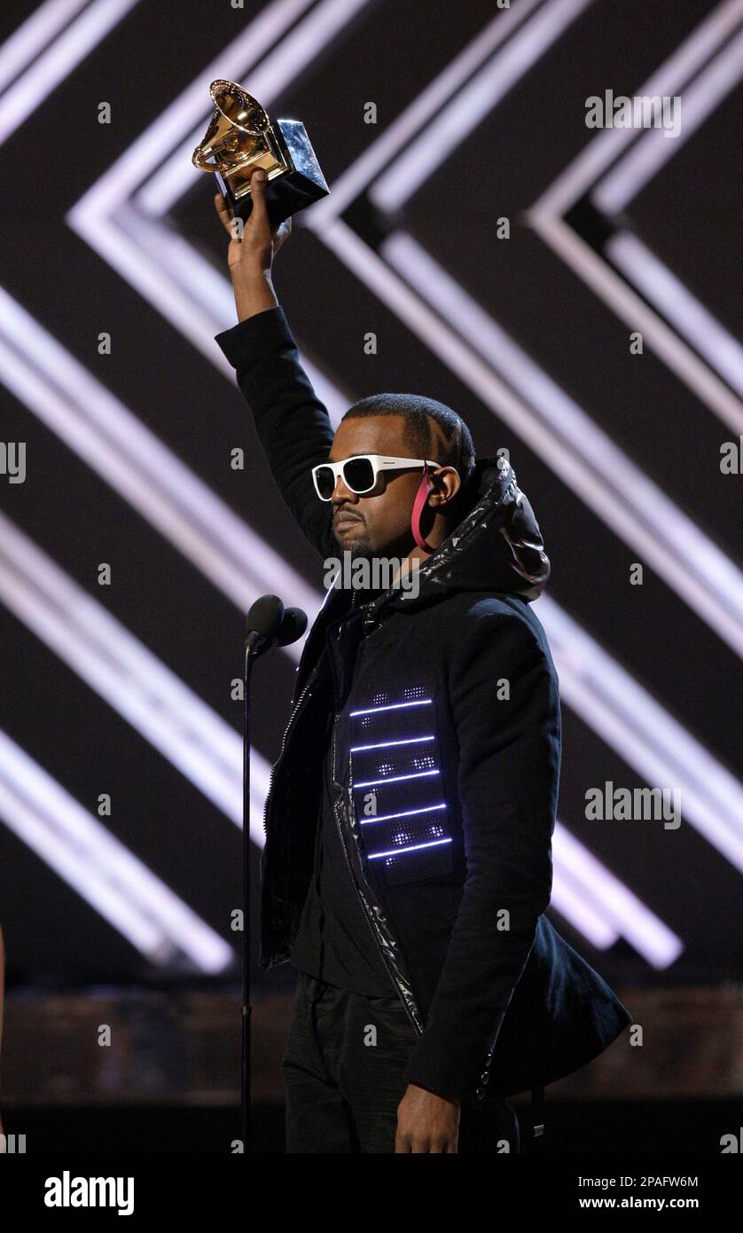 Kanye West accepts the award for best rap album for “Graduation” at the ...